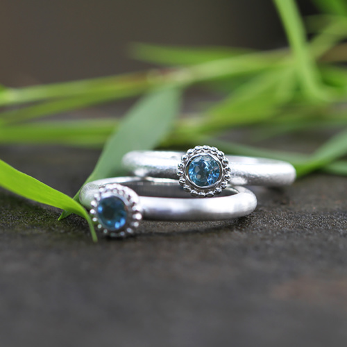 A royal ring design with Blue Topas | zea design